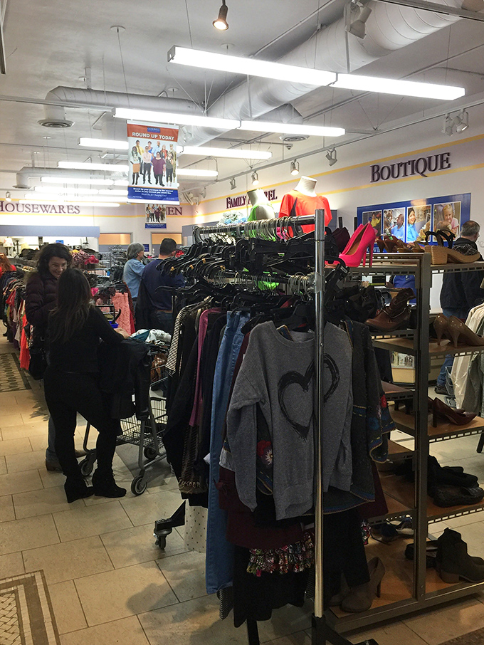 The thrill of the hunt in action &ndash; shoppers navigate racks with the focused determination of archaeologists uncovering ancient artifacts.