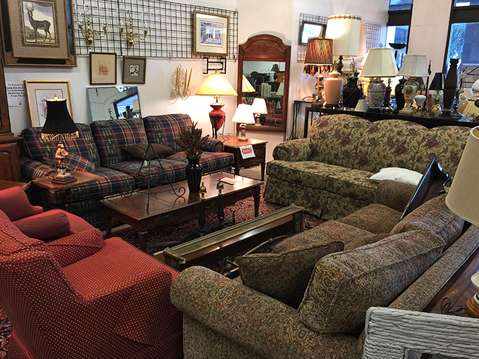 A living room showroom where every couch has stories and that plaid number definitely saw the '70s firsthand.