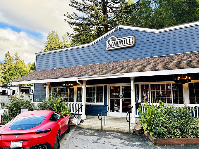 The Sawmill's blue clapboard exterior isn't just Instagram-worthy – it's a promise of comfort food that'll make you forget your phone exists.