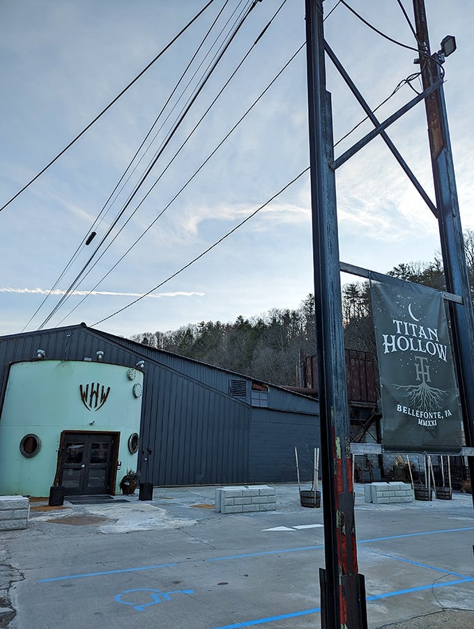 Titan Hollow Brewery transformed an industrial space into a community gathering spot. The building's mint-green entrance hints at the creative brews waiting inside.