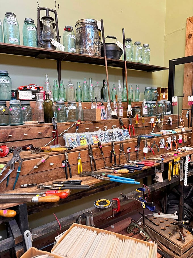 A workbench that would make your grandfather weep with joy. Mason jars and vintage tools tell stories of craftsmanship from when things were built to last.