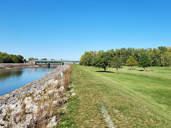 The serene Sandusky River flows peacefully alongside green spaces, offering residents and visitors alike a perfect spot for contemplation or an impromptu picnic.