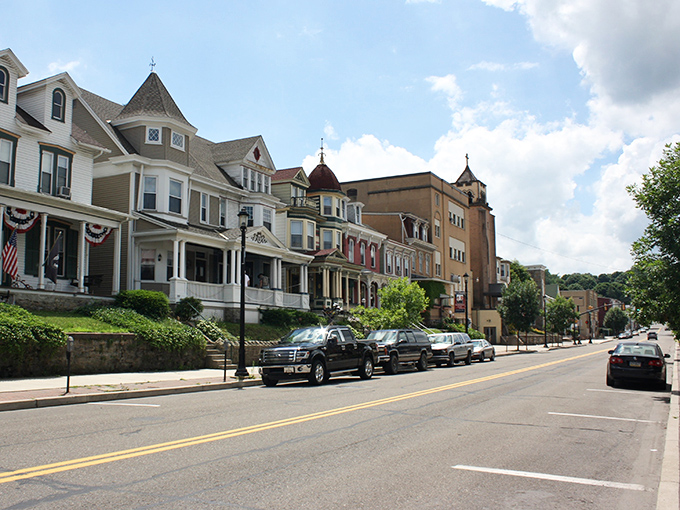 Victorian-era homes line West Broad Street, showcasing architectural details that would cost a fortune elsewhere but here remain refreshingly within reach.