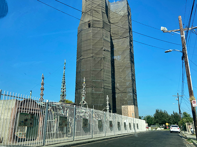 Under renovation but still magnificent, the towers stand sentinel over the neighborhood like patient guardians of artistic possibility.