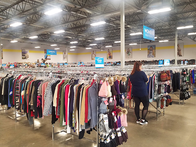 Ladies' fashion paradise unfolds in organized chaos, from boardroom blazers to weekend warrior wear.