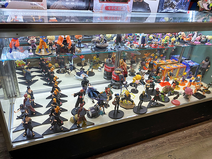 Someone's anime collection exploded in the best possible way – these figures have more personality than most reality shows.