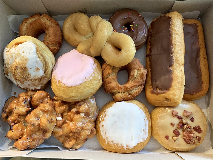 Donut nirvana in a box! From apple fritters to chocolate long johns, each handcrafted treat promises a moment of pure Michigan bliss.