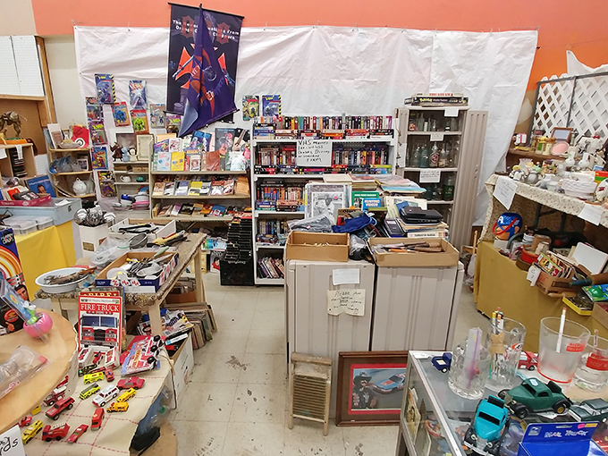 This booth is the definition of organized chaos&mdash;where vintage books, toys, and collectibles create a time-traveling experience.