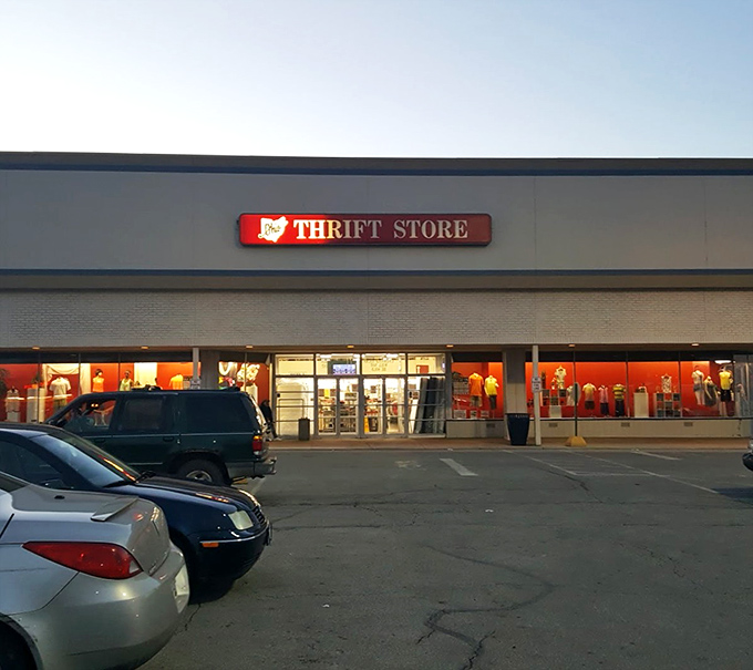 As dusk settles, Ohio Thrift's illuminated storefront beckons like a lighthouse for the budget-conscious shopper seeking retail therapy.