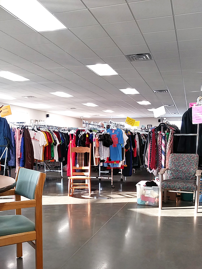 A rainbow of previously-loved fashion awaits new homes. That blue shirt might have attended Woodstock, while that dress could tell tales of Reagan-era dinner parties.