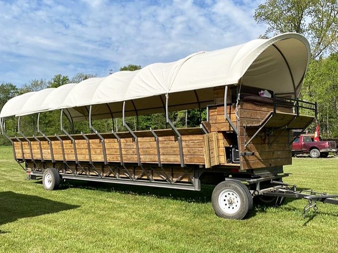 Not your average Uber! This modern covered wagon combines historical authenticity with just enough comfort to keep your posterior from staging a revolt.