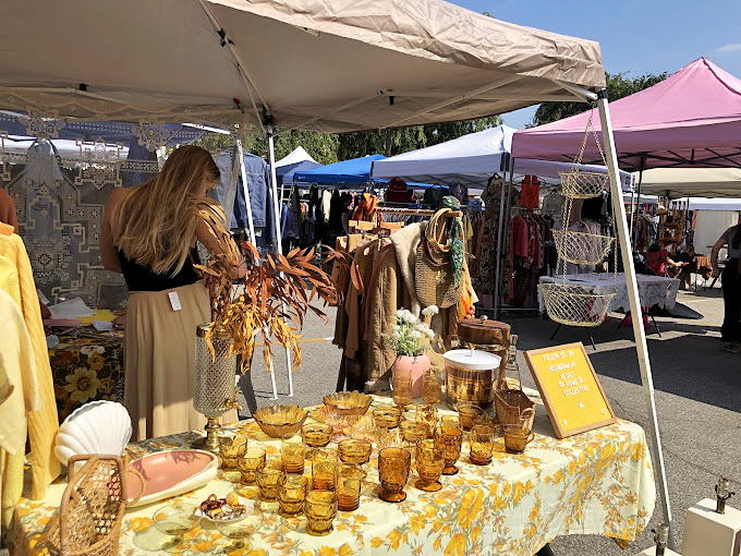 Amber glassware catches California sunshine like liquid gold, making every sip feel like a celebration.