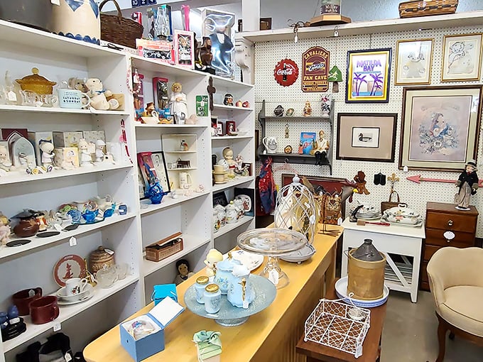 Every shelf tells a different story, from vintage pottery to framed memories that once graced someone's cherished home.