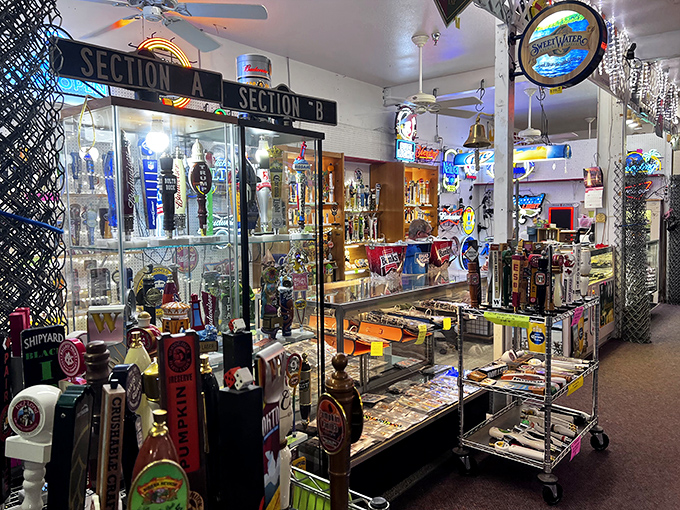 Beer tap handles and collectibles galore! This booth is where nostalgia meets commerce in a display case of memories waiting to be purchased.