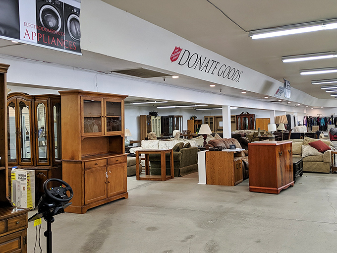 Furniture heaven awaits! This well-organized wonderland of wooden cabinets and cozy couches proves secondhand doesn't mean second-rate.