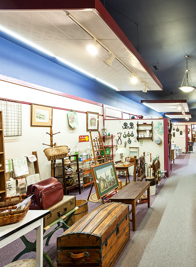 Walking these aisles feels like stepping into your eccentric aunt's attic, if your aunt collected everything from steamer trunks to vintage artwork.