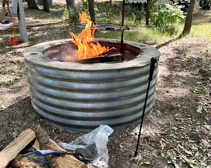 Campfire chemistry: Nothing transforms ordinary marshmallows into memory-making magic quite like this rustic fire pit under a canopy of Michigan stars.