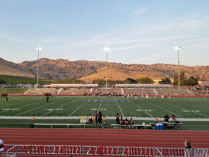Friday night lights illuminate more than just football games here&mdash;they spotlight a community that shows up for each other, mountain backdrop included.