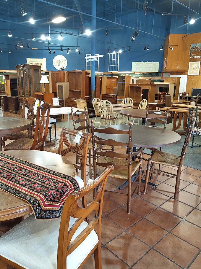 A forest of dining tables and chairs awaits, each with stories of family dinners, homework sessions, and that time Uncle Bob fell asleep face-down in the mashed potatoes.
