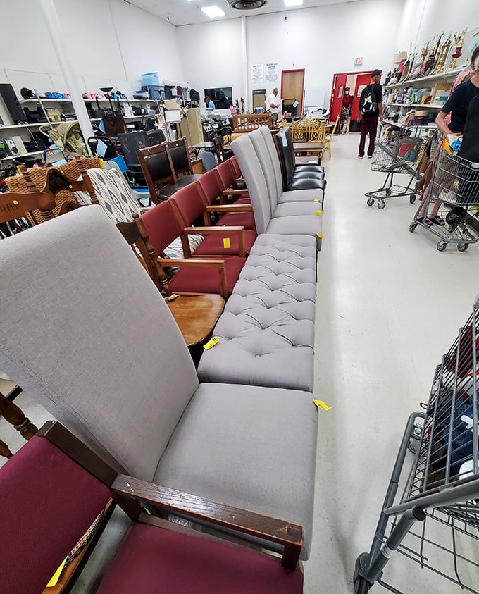 The chair lineup looks like a furniture version of a police suspect wall. "That gray tufted number? Yeah, he's guilty of being ridiculously comfortable."