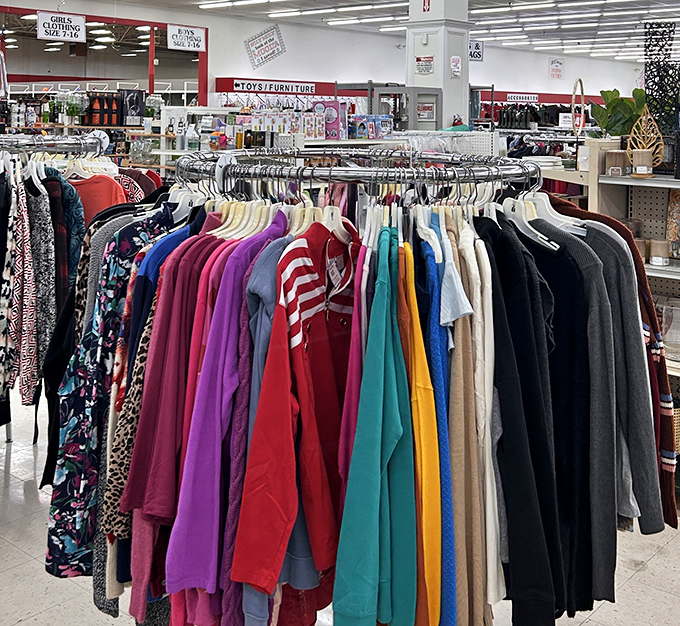 Rainbow racks of clothing stretch endlessly, each garment waiting for its perfect second-chance romance story.