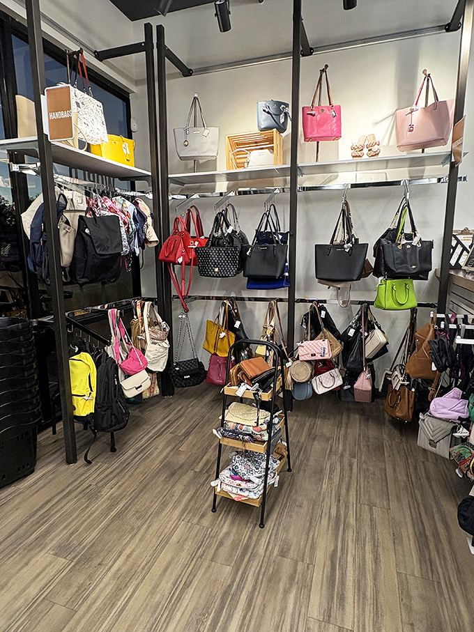 Handbag heaven! Designer purses in every color imaginable stand at attention, waiting for their second chance at arm candy stardom.