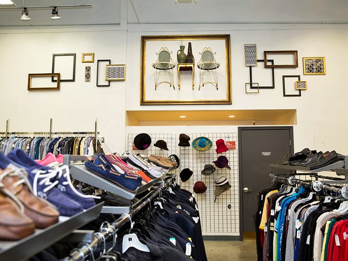 The artful wall displays elevate this Goodwill beyond typical thrift stores, creating a boutique feel without the boutique prices.