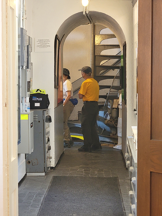 The spiral staircase beckons visitors upward, a dizzying climb that's equal parts architectural marvel and cardio workout.