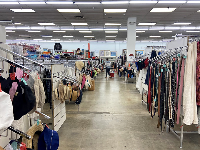 Not just an aisle, but a runway of possibilities. Each rack holds someone's past fashion choices waiting to become your next favorite outfit.