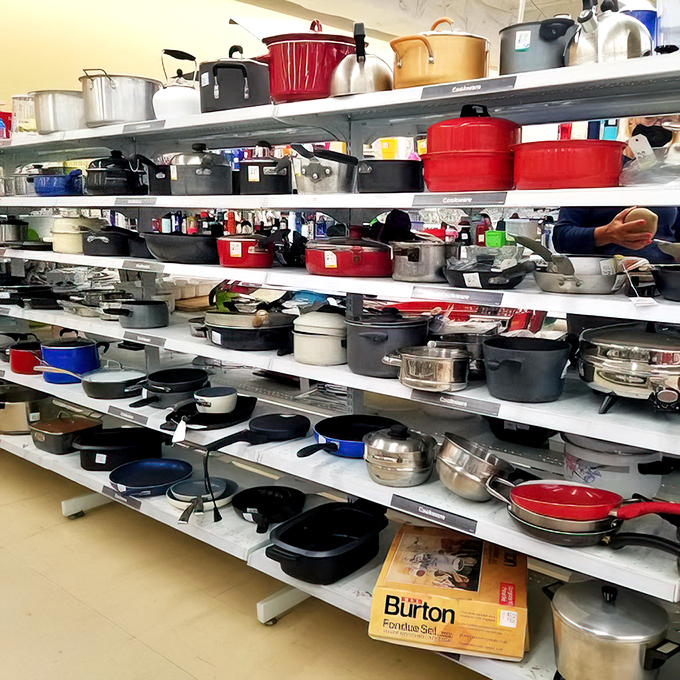 Pots and pans line shelves like culinary soldiers, ready to serve new kitchens at fraction prices.