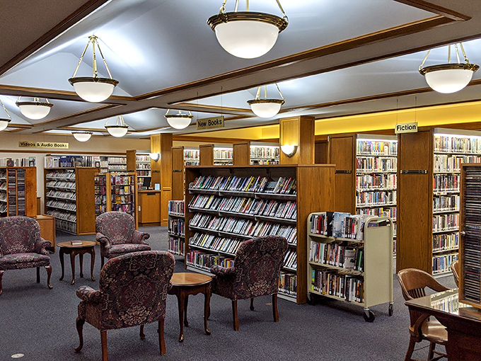Cozy reading nooks invite literary explorers to settle in. These plush chairs have witnessed countless readers falling into fictional worlds.