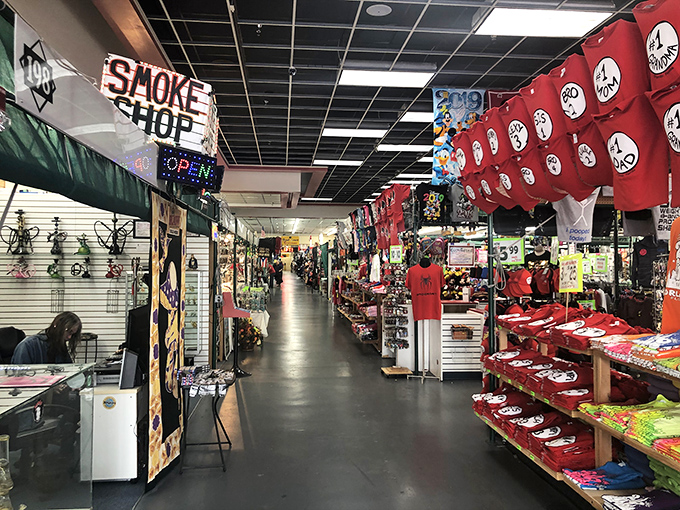 Down these hallowed halls of commerce, smoke shop signs and red t-shirts beckon like sirens to sailors of savings.