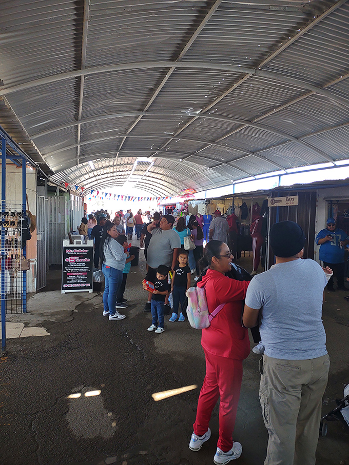 Beneath the curved metal ceiling, shoppers navigate a labyrinth of possibilities. This isn't shopping&mdash;it's an archaeological expedition for modern treasures.