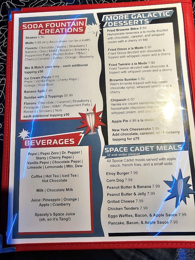 The menu reads like NASA met a 1950s soda fountain. "Spacely's Space Juice" is just Tang, but somehow that makes perfect sense here.