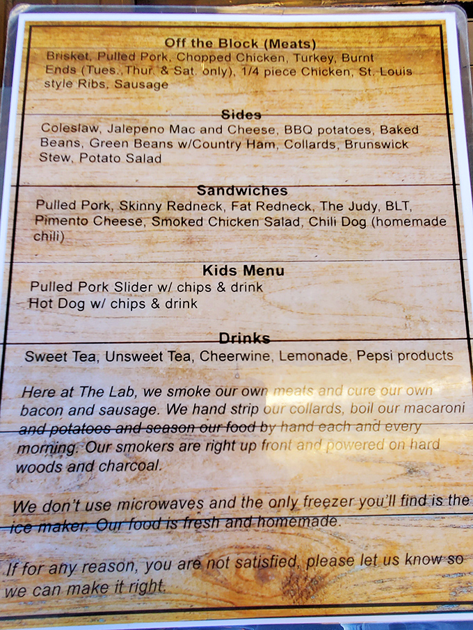 A menu that cuts straight to the chase. No flowery descriptions needed when your food speaks volumes through smoke signals.