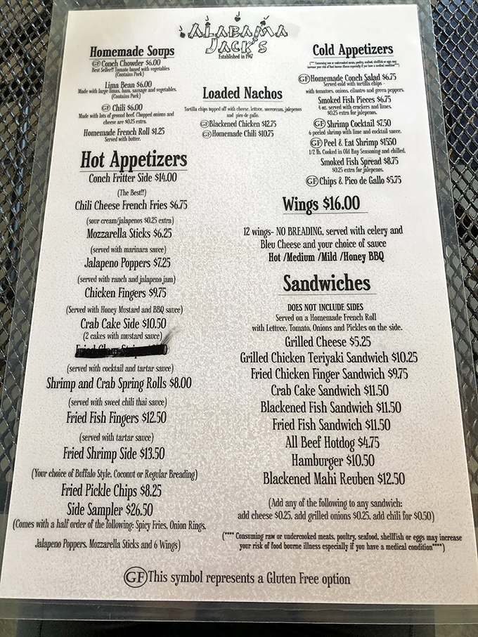 This menu reads like a love letter to seafood lovers. The conch fritters alone have probably prevented countless northward migrations.