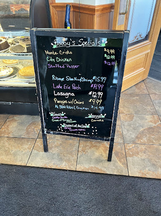 This chalkboard menu reads like a love letter to Eastern European comfort food. Pierogi, paprikash, and American classics living in delicious harmony.