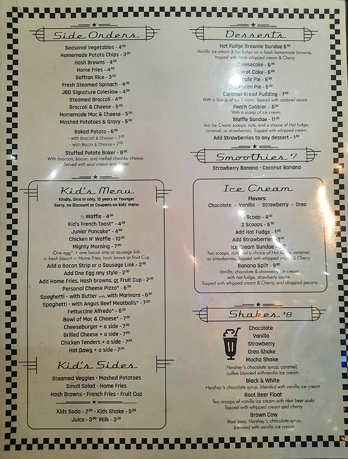 The menu's checkered border isn't just decorative—it's a checkered flag signaling you've won the comfort food race. From waffles to shakes, decisions have never been so deliciously difficult.
