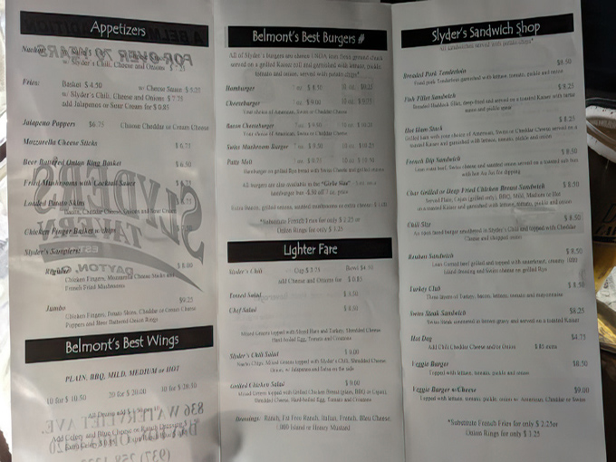 A menu that doesn't need fancy fonts or flowery descriptions&mdash;just the straightforward promise of "Belmont's Best Burgers" that keeps locals coming back.