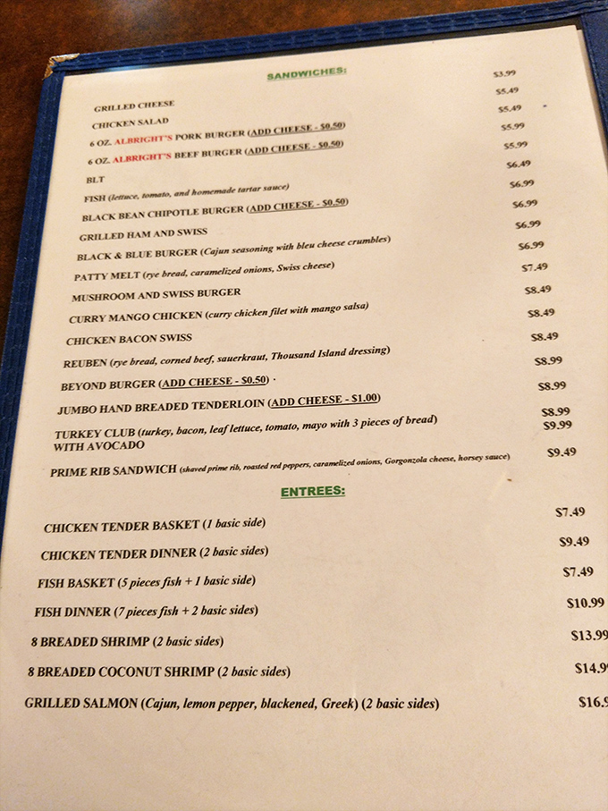 A menu that reads like a love letter to comfort food classics. The prime rib sandwich description alone might be worth framing.