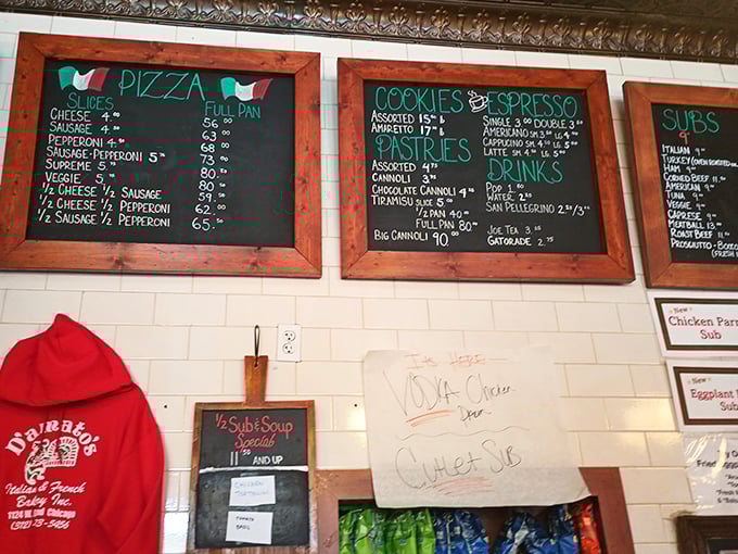 That menu board tells you everything you need to know about priorities here. Pizza, cookies, cannoli &ndash; the holy trinity of Italian comfort food.
