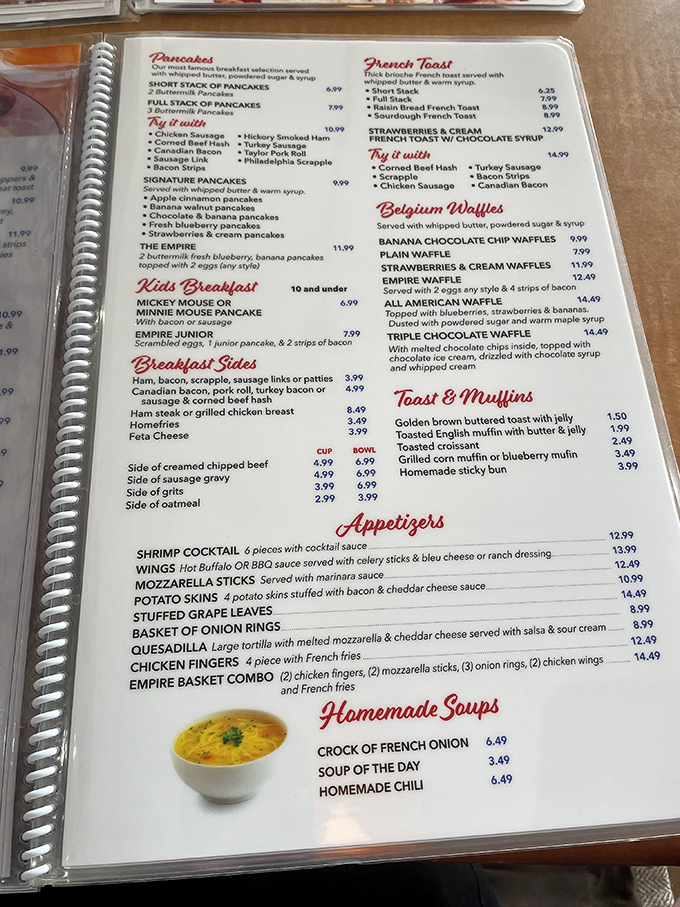 This menu isn't just reading material&mdash;it's a roadmap to happiness. The pancake section alone deserves its own ZIP code.