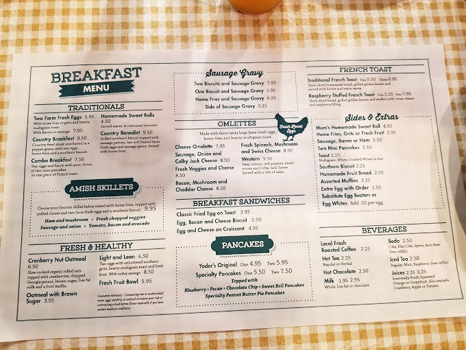 A breakfast menu that reads like poetry to hungry souls. Whoever said "you can't buy happiness" clearly never tried Yoder's Amish skillets.