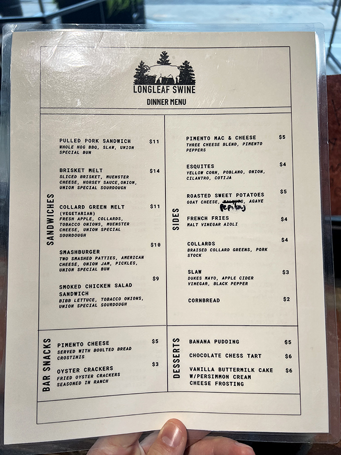 This menu reads like barbecue poetry &ndash; pulled pork, brisket melts, and banana pudding forming a holy trinity of Southern comfort.