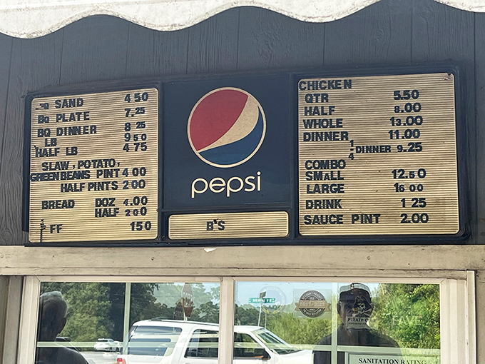 The no-frills menu board tells you everything you need to know&mdash;barbecue, chicken, sides, and not a kale salad in sight.