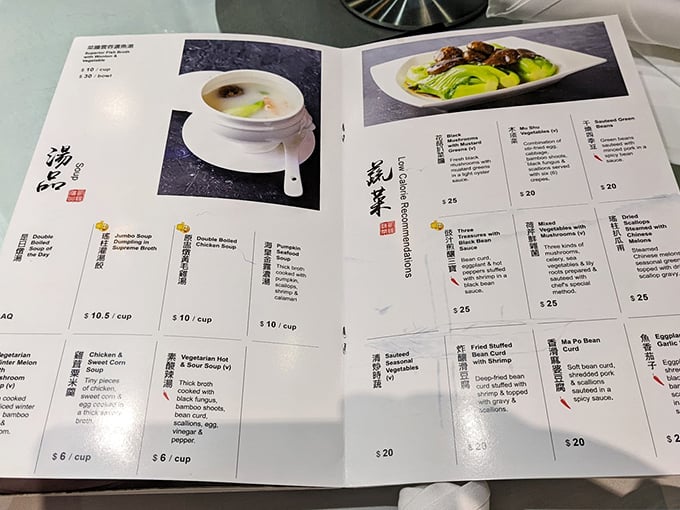 The menu reads like a delicious roadmap to Chinese culinary provinces. Each page is essentially a passport to flavor without the jet lag.