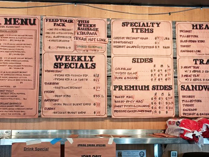 This menu board isn't just a list&mdash;it's a roadmap to happiness. Weekly specials like "Pork Belly Burnt Ends" are basically permission slips for culinary joy.