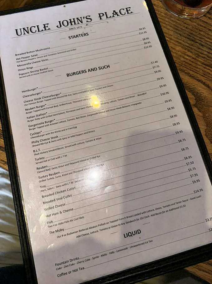 A menu that reads like a love letter to American classics. The "Cyclops" burger with its fried egg hat is calling my name. 