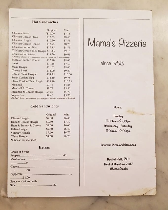 The menu board reads like a love letter to Caribbean cuisine, with each item promising a vacation for your taste buds.