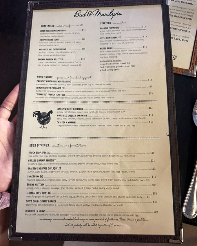 A menu that reads like a love letter to American comfort food. Each dish tells a story, and trust me, you'll want to hear every word.